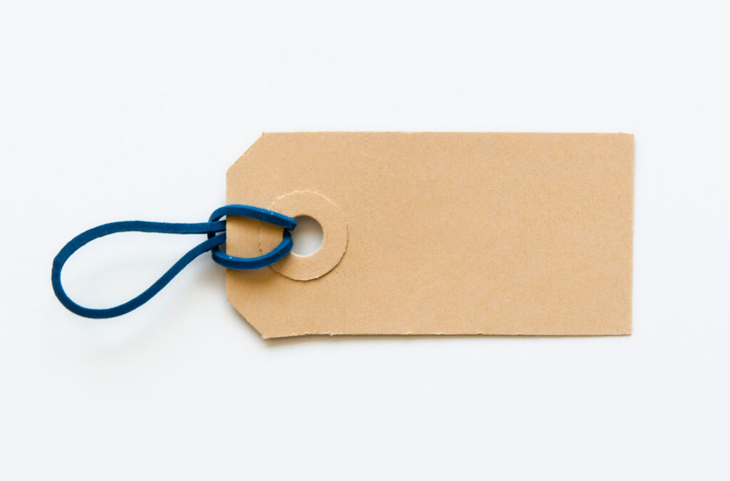 Come si fa un’etichetta con un foro o un’asola? - Vico Etichette